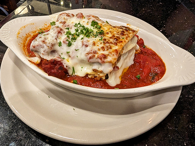 This lasagna layers comfort upon comfort, creating a cheesy masterpiece that defines Italian-American dining perfection.