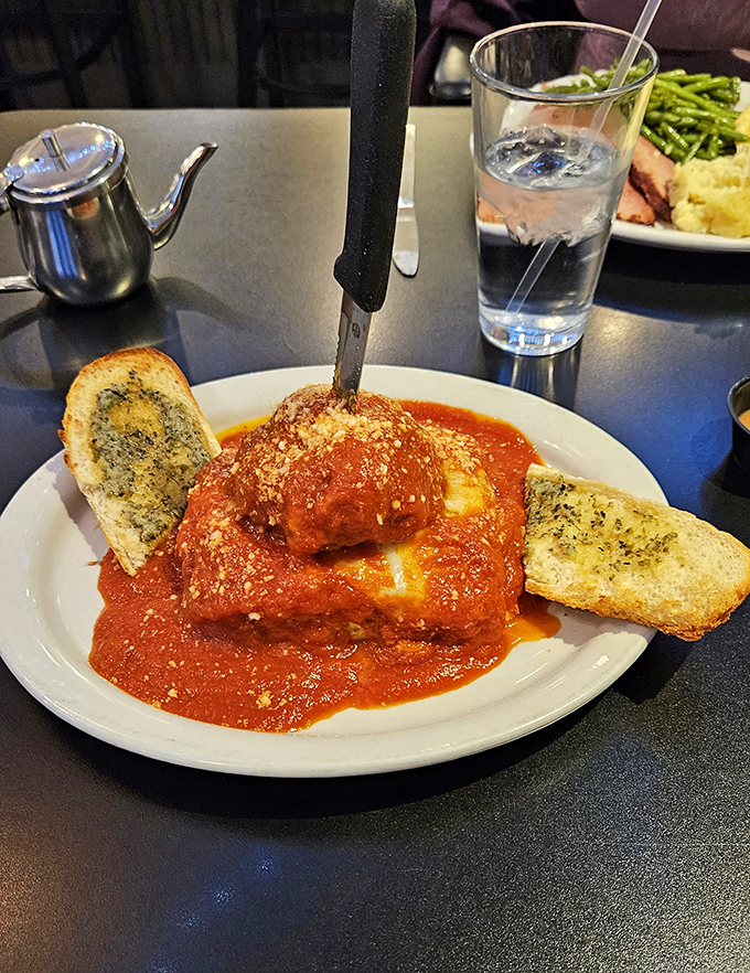 Layers of cheesy, saucy lasagna goodness that could end family feuds and start new friendships.