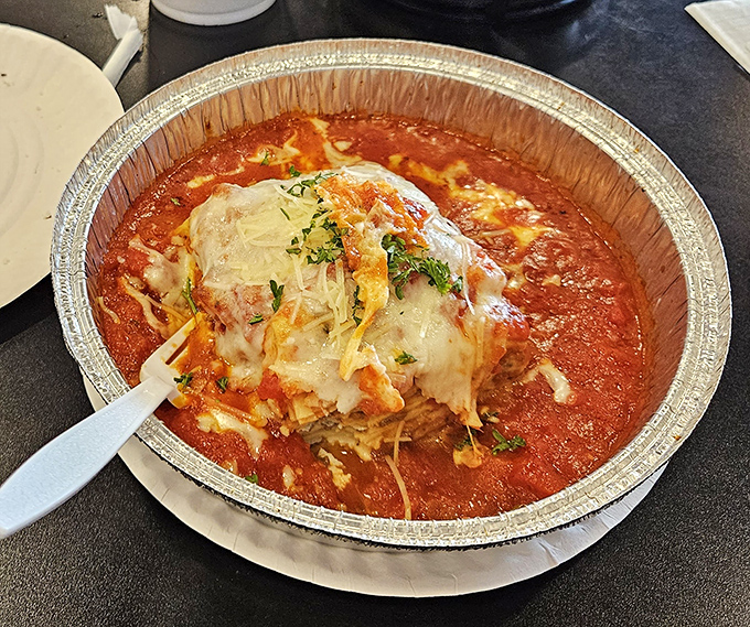 Lasagna that's having an identity crisis as a hot tub for cheese&mdash;and we're here for every bubbling, saucy moment of it.