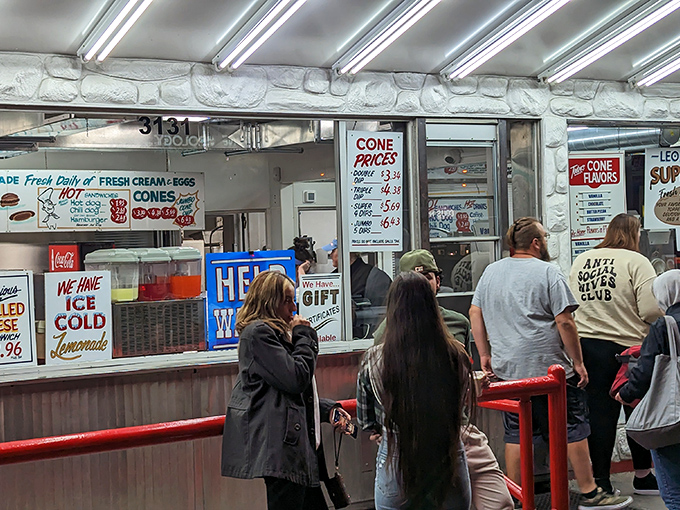 Fluorescent-lit heaven where decisions get made and custard gets serious attention from devoted staff.