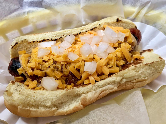 The Dixie Dog doesn't just satisfy hunger – it tells a story with each bite, topped with a generous sprinkle of diced onions and cheese.