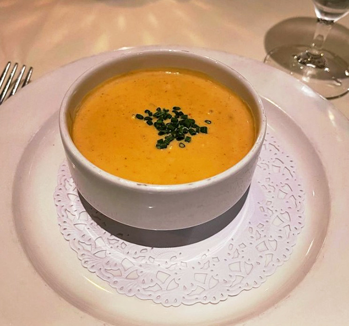 This lobster bisque isn't just soup; it's a velvety ocean of flavor that makes you wonder why we bother eating anything else.