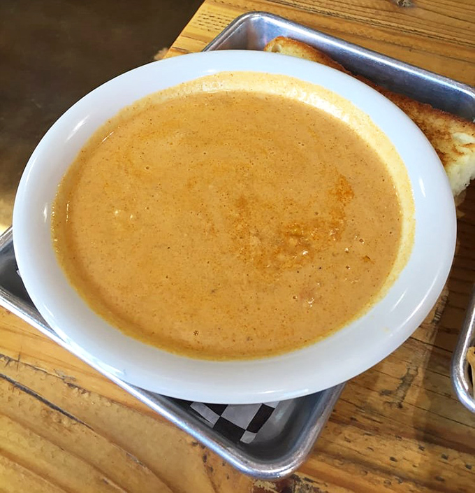 This isn't just soup—it's liquid gold. The lobster corn chowder promises comfort in a bowl, with a side of toasted bread for essential dipping operations.