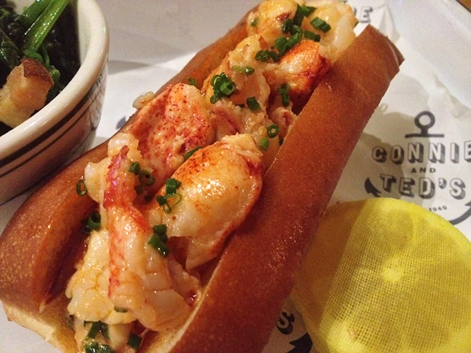 Lobster roll perfection: sweet chunks of lobster nestled in a buttery split-top roll&mdash;the kind of sandwich that demands silence while eating, broken only by involuntary sighs.