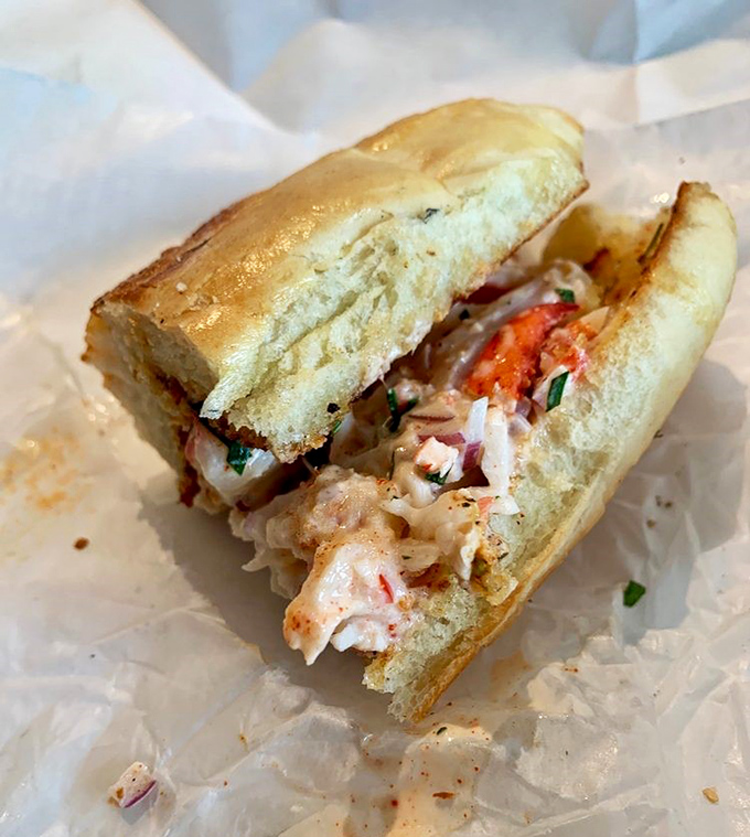 Seafood perfection nestled in pillowy bread – proof that sometimes the simplest presentations deliver the most profound flavor experiences.