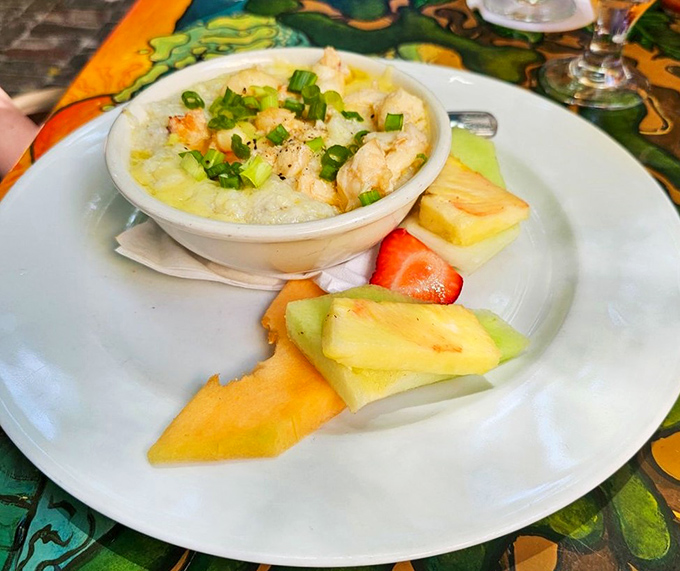Lobster and grits with fresh fruit&mdash;the breakfast equivalent of wearing a tuxedo with flip-flops. Somehow, it works brilliantly in Key West.