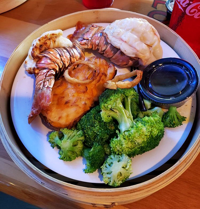 When lobster tail meets artistic presentation, even your camera wants to applaud before you dig in.