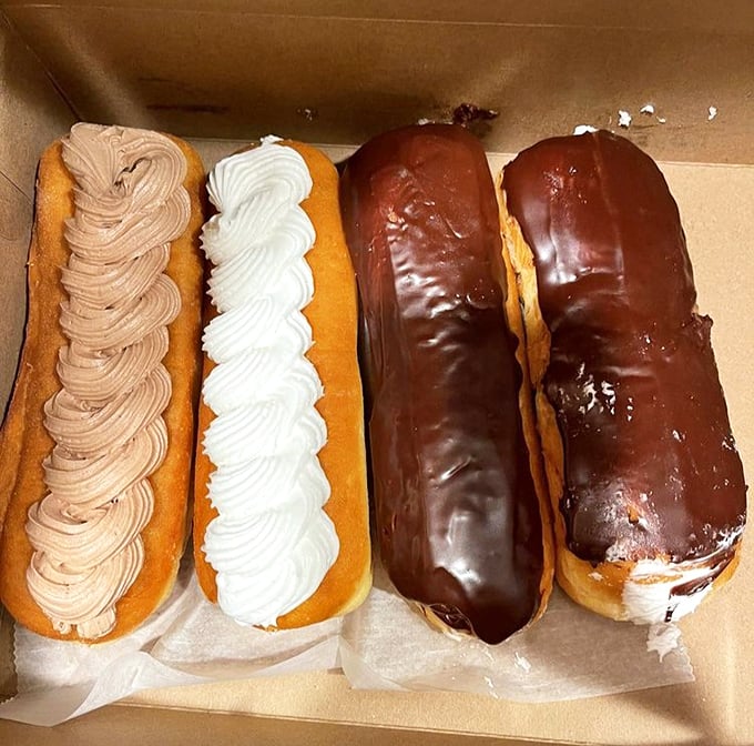 Long Johns lined up like edible works of art. The cream-filled ones are essentially breakfast eclairs, and I'm not mad about it.