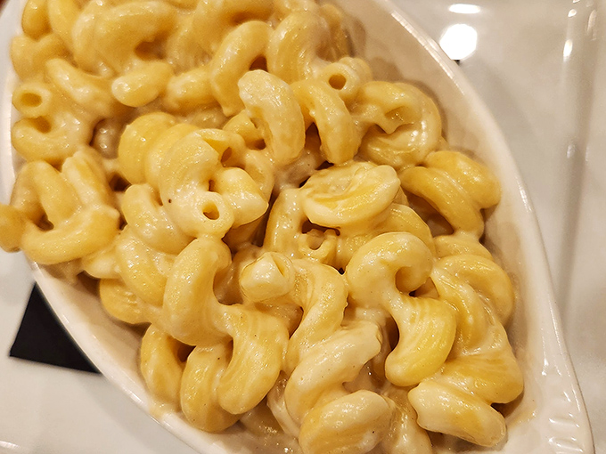 Mac and cheese so creamy and comforting, it's like a warm hug from your favorite grandmother.