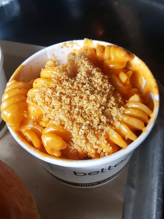 Mac and cheese that achieves the impossible: both creamy and structured, topped with breadcrumbs that add the textural contrast your mouth didn't know it needed.