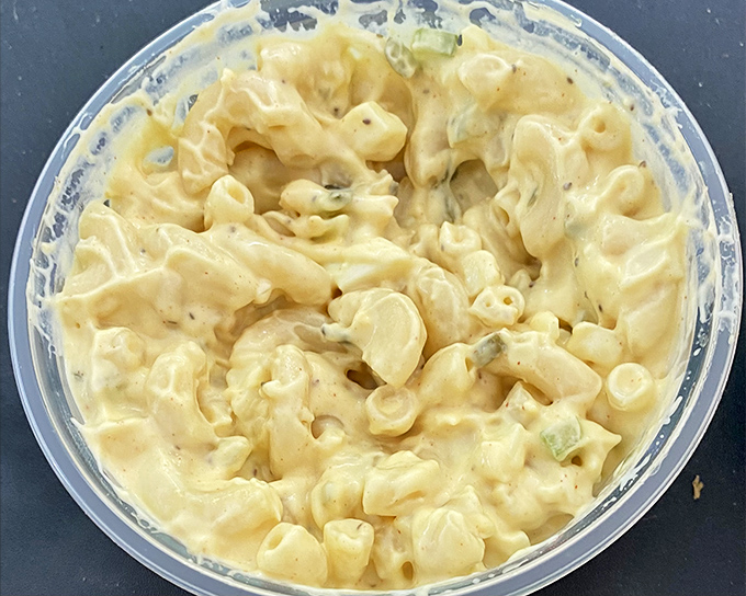 Mac salad that your picnic dreams are made of. Creamy, tangy, and studded with just the right amount of crunch.