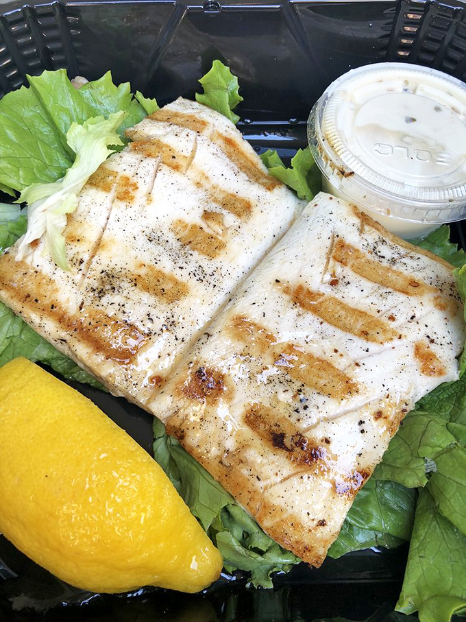 Perfectly grilled mahi-mahi that needs nothing more than a squeeze of lemon and a view of the Pacific. Simple food done right.