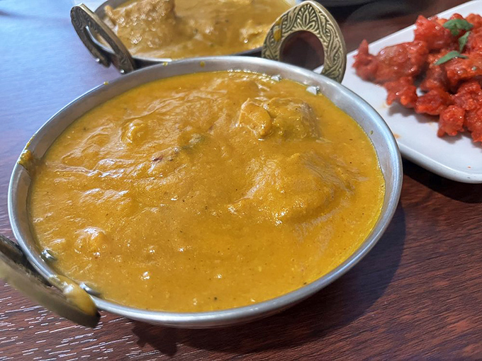 This golden curry is the liquid sunshine of comfort food—rich, velvety, and capable of improving even the gloomiest Erie winter day.