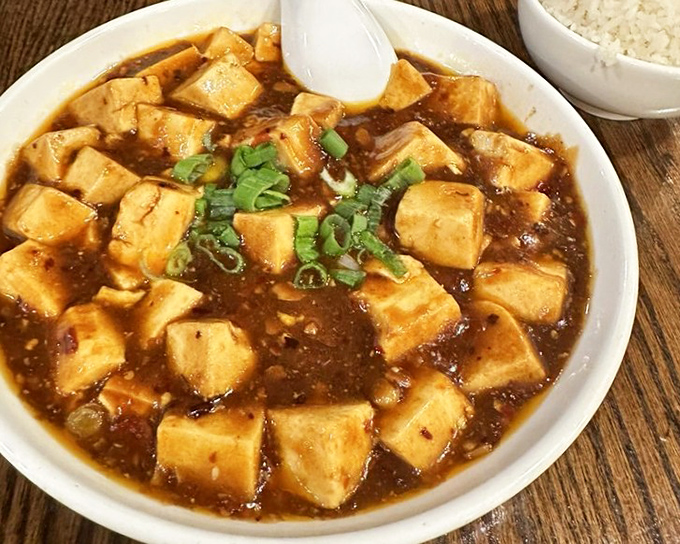 Mapo tofu swimming in sauce that'll wake up taste buds you forgot you had.