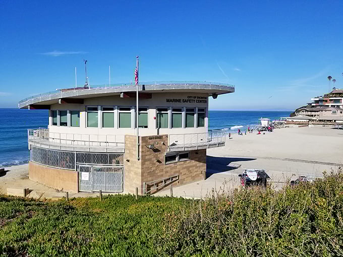 The Marine Safety Center stands guard like a lighthouse of reassurance, where lifeguards scan the waters with the focus of master chess players.