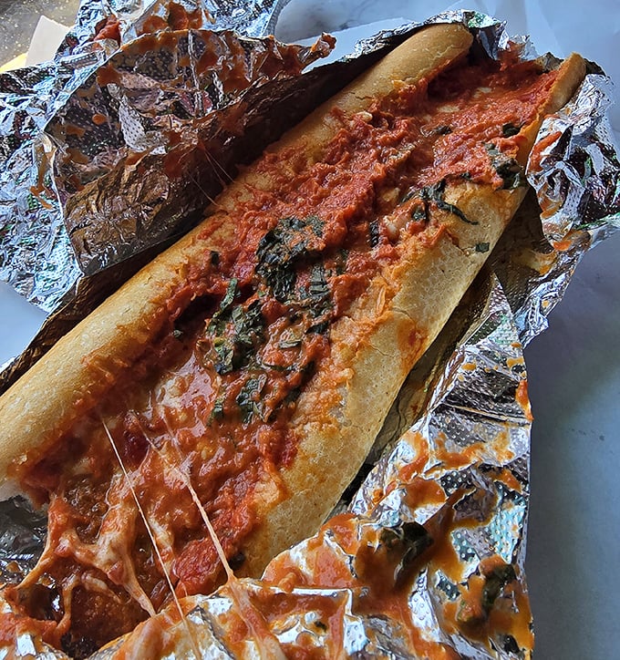 When a meatball sub requires this much foil, you know you're in for something serious. The sauce-to-bread ratio here is mathematical perfection.