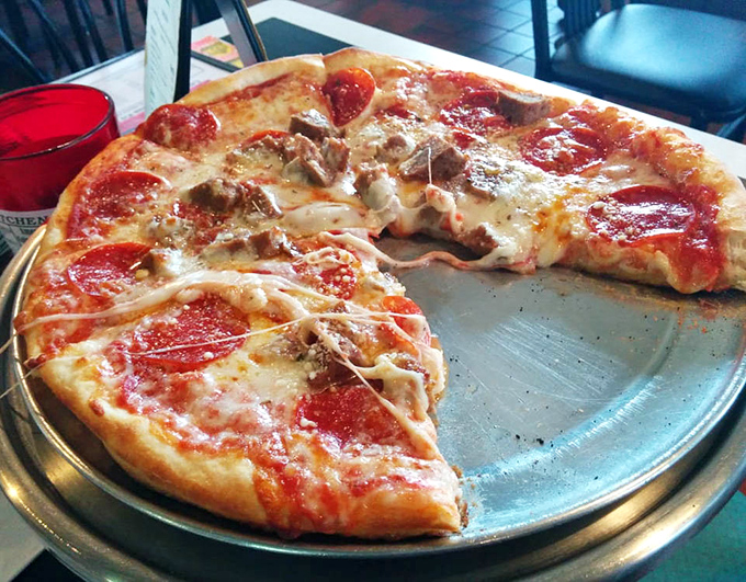 Half-eaten yet fully appreciated&mdash;this pepperoni and meatball pizza demonstrates the perfect ratio of cheese stretch to crust chew that pizza scientists have sought for generations.