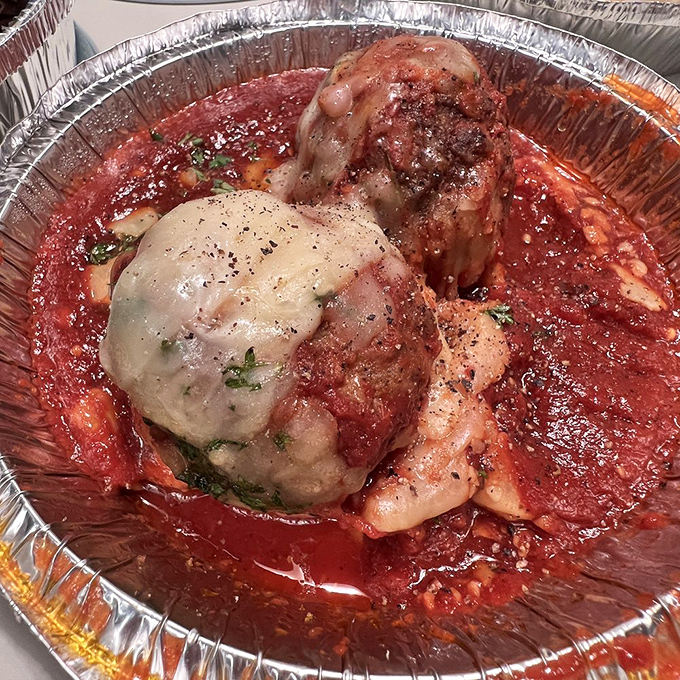 These meatballs aren't just swimming in sauce&mdash;they're doing the backstroke in a pool of flavor that would make any Italian grandmother proud.