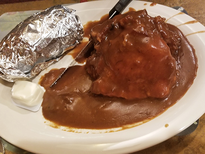 Meatloaf that doesn't just remind you of home—it makes you question why you ever left. That gravy could solve international conflicts.