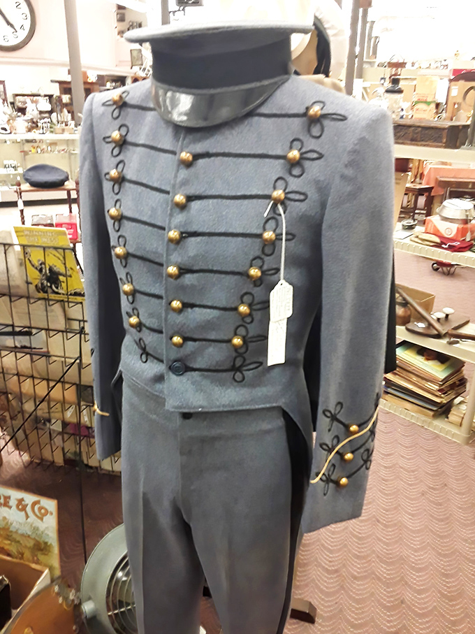 Not your average vintage clothing find! This military uniform stands at attention, brass buttons gleaming with history and ready for a new mission.