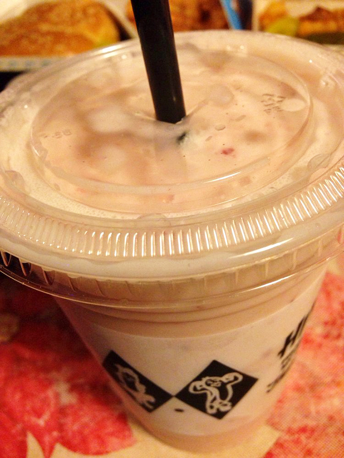 A milkshake so thick the straw stands at attention, adorned with the iconic diamond pattern that's become Chicago's tastiest coat of arms.