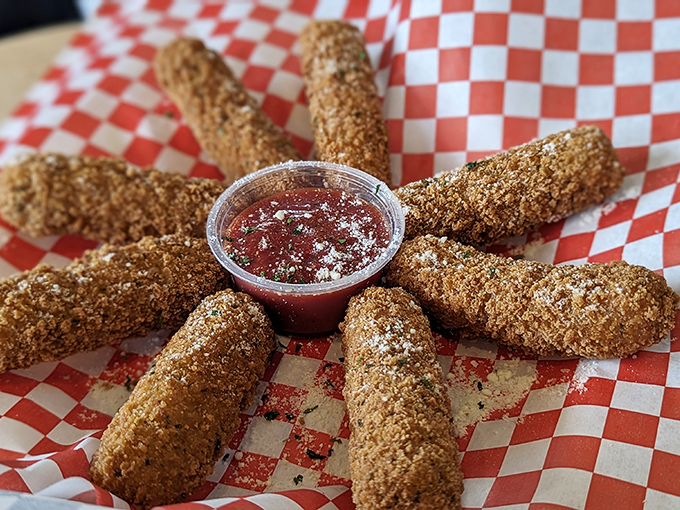 Mozzarella sticks arranged like a sunburst of crispy, gooey goodness. The marinara dip in the center is calling your name.
