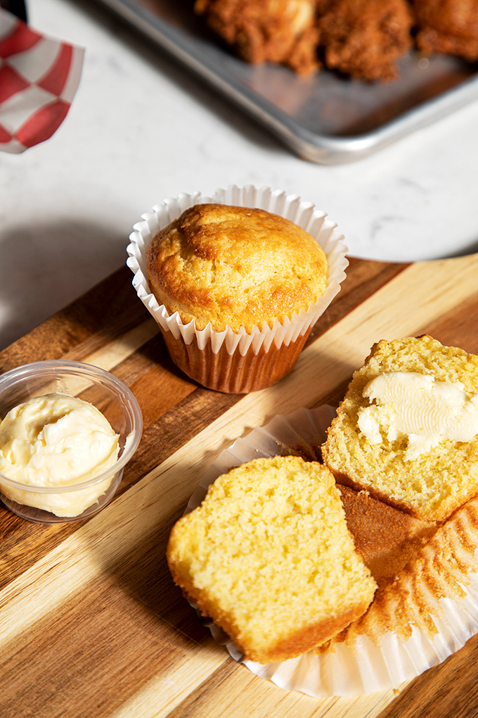Cornbread muffins so perfect they deserve their own fan club. That honey butter on the side isn't optional&mdash;it's essential to your happiness.
