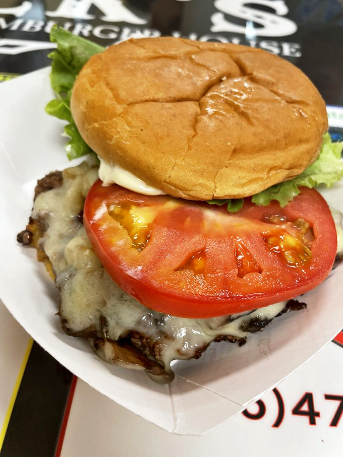 The mushroom Swiss burger arrives like a gourmet symphony disguised as humble diner fare.
