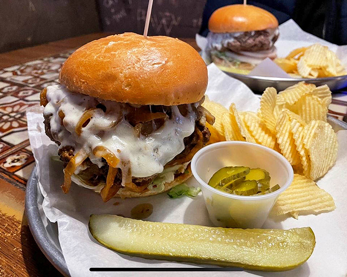 Behold the burger that launched a thousand food pilgrimages&mdash;melted cheese cascading over the patty like a dairy waterfall.