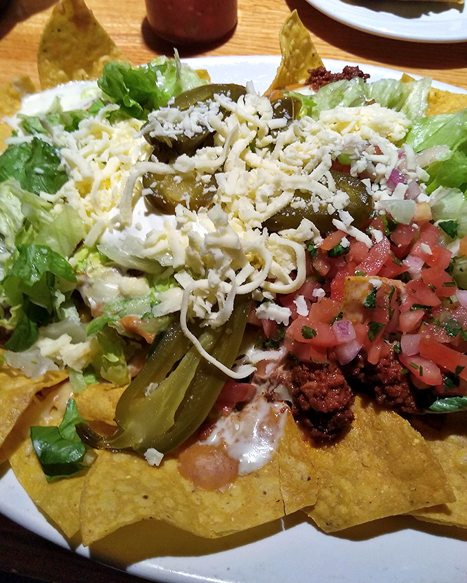 Nachos loaded with enough toppings to make you question everything you thought you knew about sharing food.