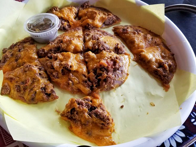 Nachos that require a strategy session before eating. The cheese-to-chip ratio here deserves a mathematical theorem.