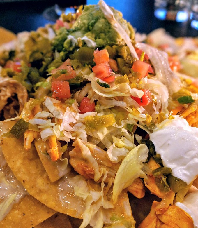 Architecture meets appetite with these nachos&mdash;each layer a carefully constructed flavor neighborhood where no chip is left behind.