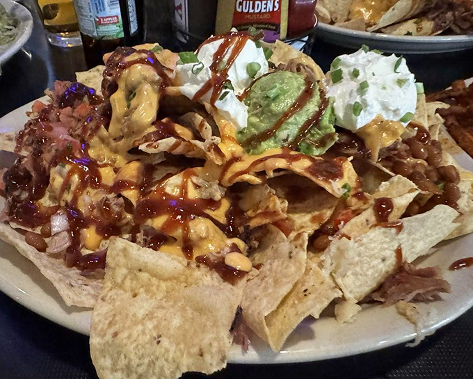 Nachos that laugh in the face of restraint. When chips meet BBQ meat, cheese, and all the fixings, resistance becomes futile.