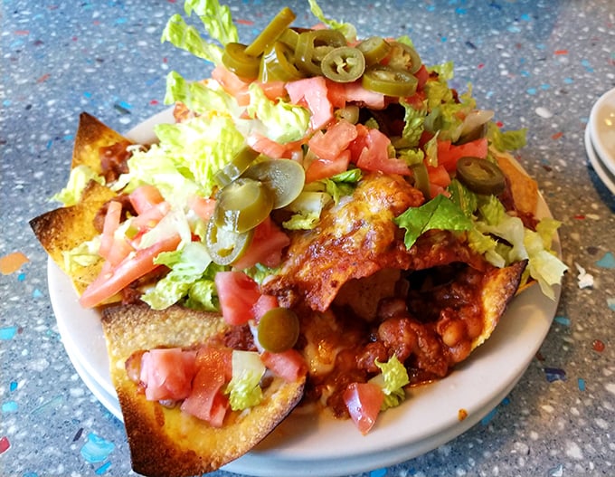 These nachos don't understand the concept of personal space. Loaded with toppings and refusing to leave any chip naked&mdash;just as it should be.