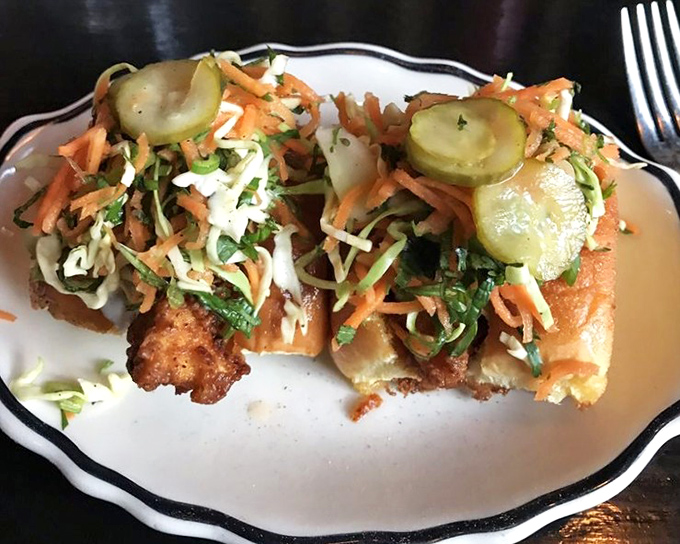 Nashville Hot Buns bring the heat in the most civilized way possible &ndash; nestled in pillowy steamed buns with cooling slaw to tame the flame.