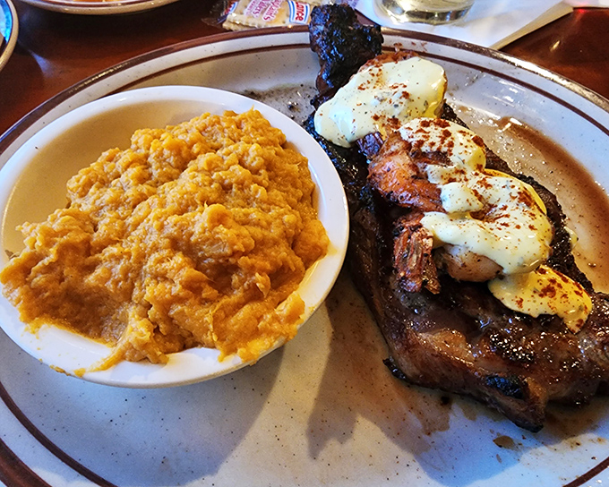When a New York strip comes topped with seafood and paired with sweet potato mash, it's not just dinner&mdash;it's a celebration on a plate.