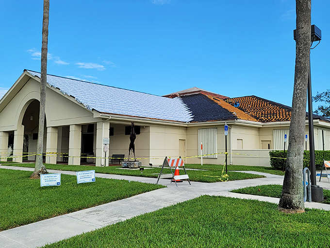 Even paradise needs repairs sometimes. This building wears its construction wounds with dignity, promising better days ahead.