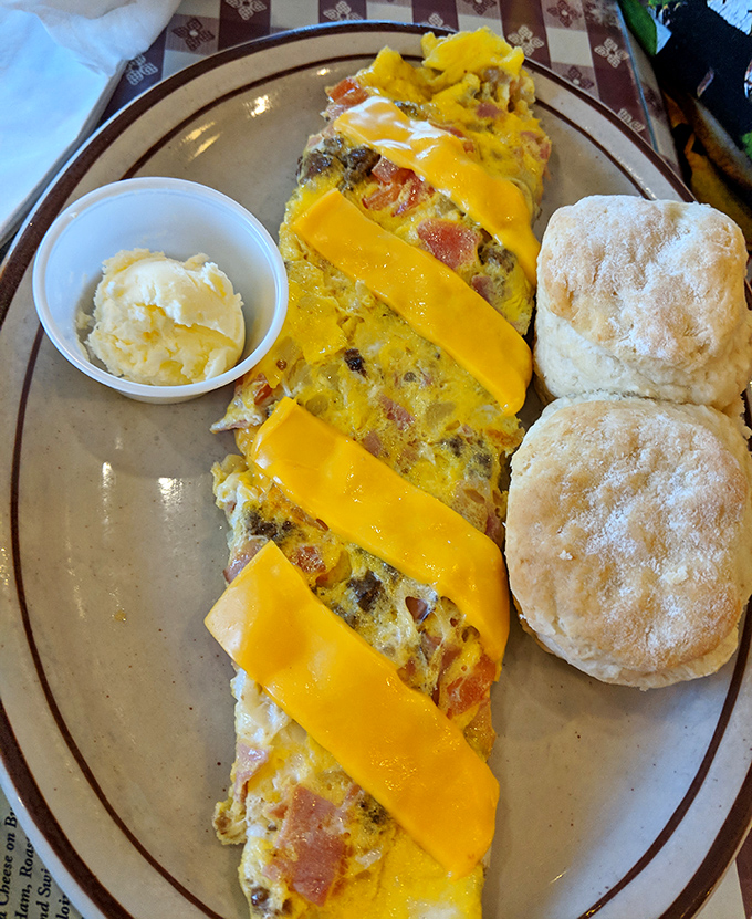 An omelet so generously stuffed it practically needs its own zip code.