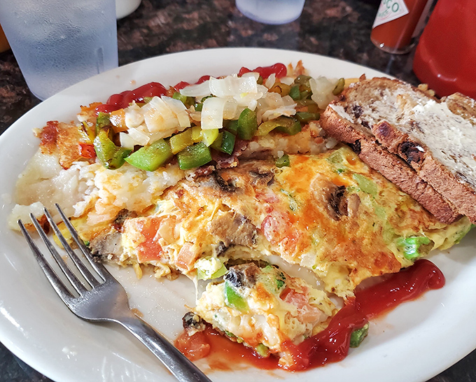 This isn't just an omelet&mdash;it's a colorful canvas of breakfast possibilities. The kind of morning masterpiece that makes you rethink hitting the snooze button.