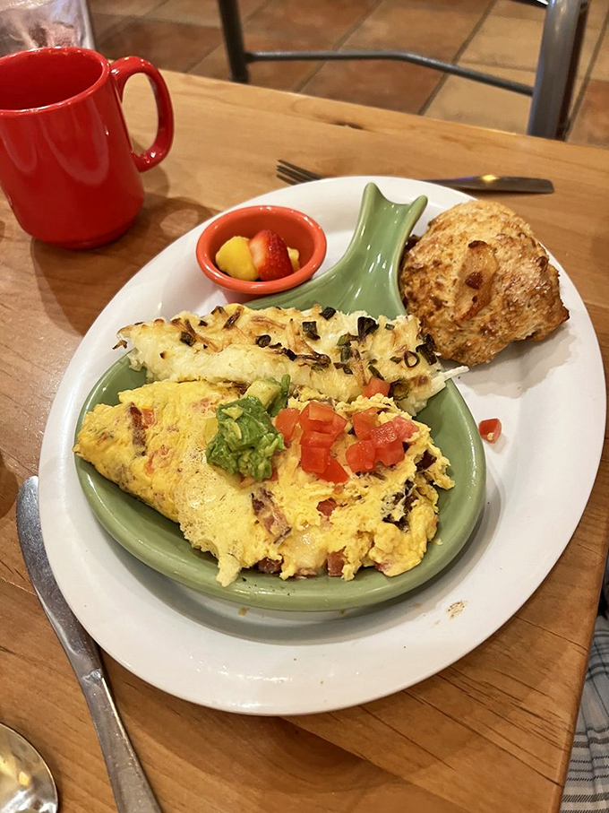 This omelet has more fillings than my last dental appointment, but tastes considerably better and comes with toast instead of a bill.