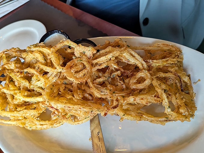 The onion loaf isn't just an appetizer&mdash;it's an engineering marvel. Crispy, golden layers stacked higher than a Wisconsin winter snowdrift.