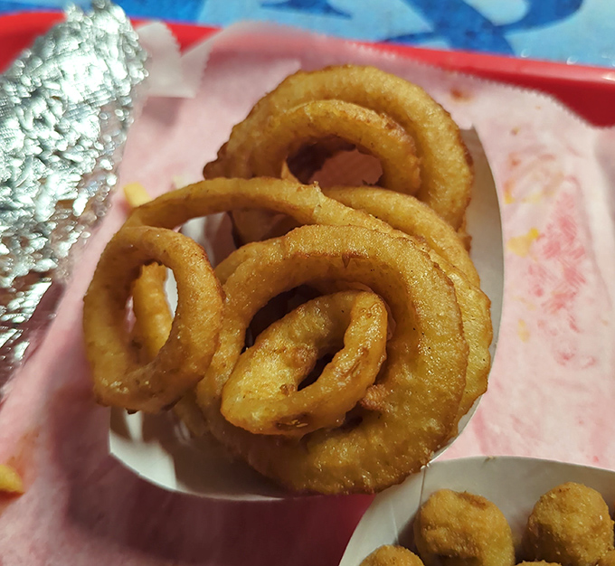 Perfect onion rings don't exi&mdash; Oh wait, here they are. Golden halos of happiness that make you forget vegetables are supposed to be good for you. 