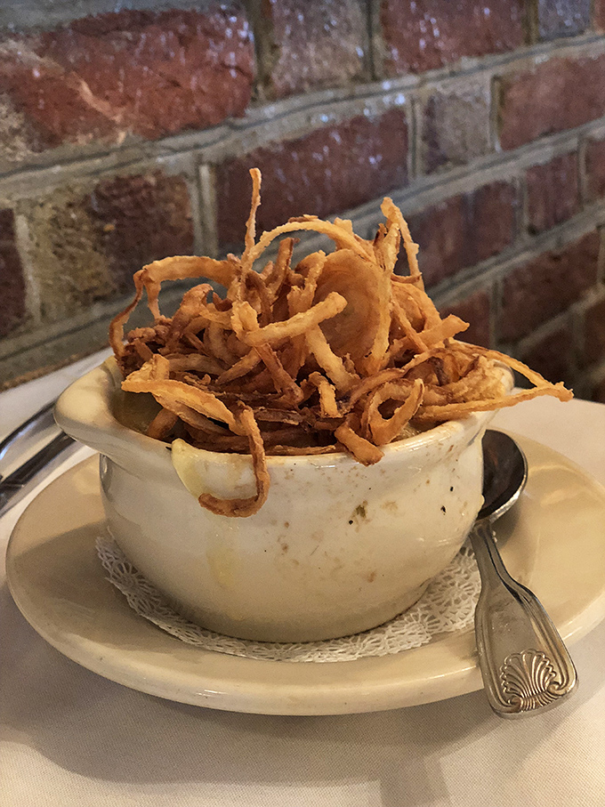 French onion soup that's wearing its cheese crown with pride&mdash;a bowl of comfort that makes you wonder why anyone bothers with fancy molecular gastronomy.