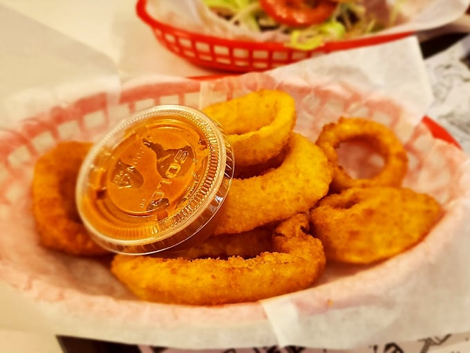 Golden-fried onion rings with that perfect crunch-to-softness ratio&mdash;the supporting actor that sometimes steals the whole show.