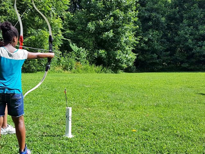 Bullseye in the wilderness: archery practice takes on new meaning when your backdrop is a canvas of endless green rather than a gym wall.