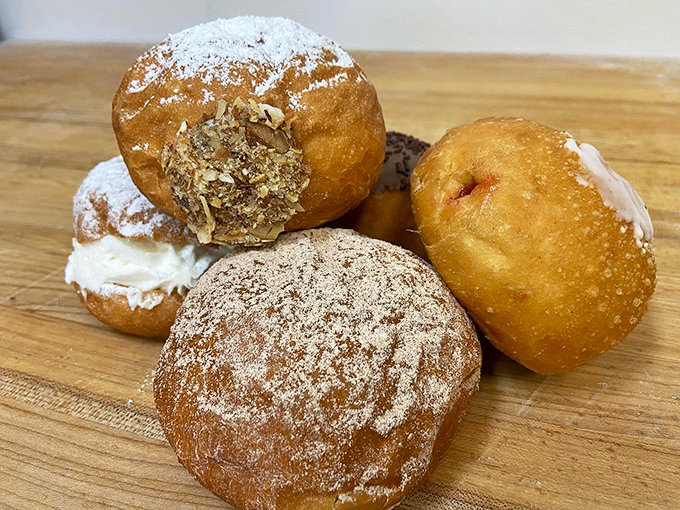 Golden-fried pączki that would make your Polish grandmother weep with joy. Filled with cream and dusted with sugar &ndash; resistance is futile.