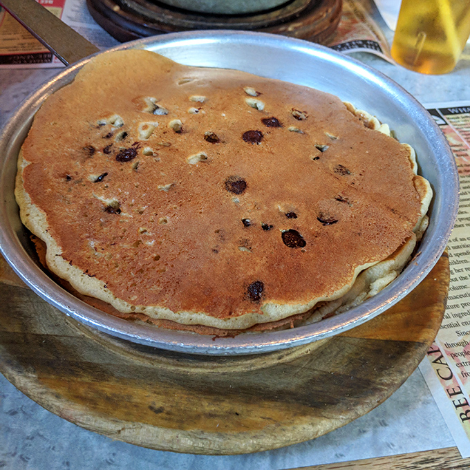 This isn't just any pancake&mdash;it's the heavyweight champion of breakfast, taking up the entire pan with blueberry freckles that wink at you with each bite.