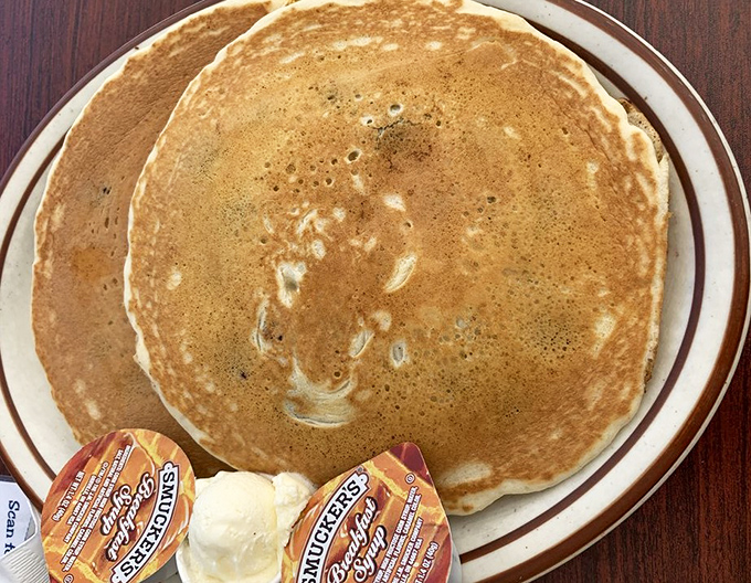 Pancakes so perfectly golden they make you wonder if the chef has some secret pancake-flipping superpower.