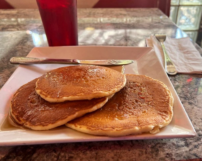 These pancakes aren't just breakfast, they're edible gold medals—perfectly bronzed, impossibly fluffy, and worthy of their own Instagram account.