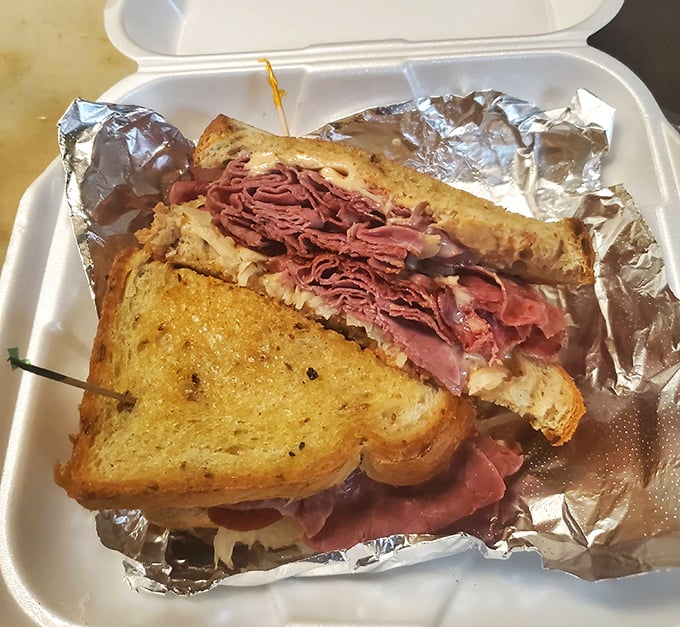 Pastrami piled high enough to require architectural engineering – this sandwich means serious business about lunch.